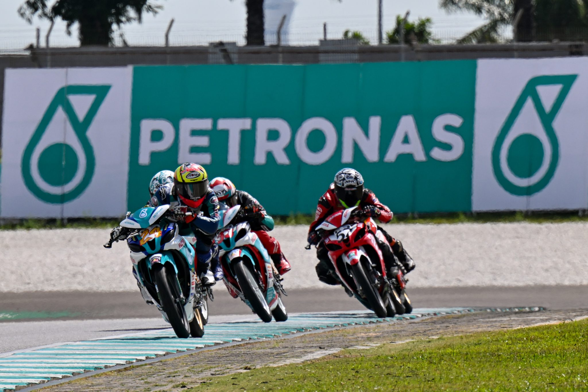 Izam Achieved a Remarkable Hat-trick - iMotorbike News